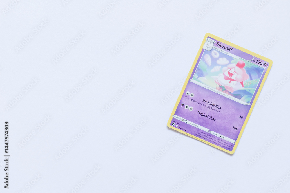 Slurpuff pokémon trading card shot on a white paper background ...