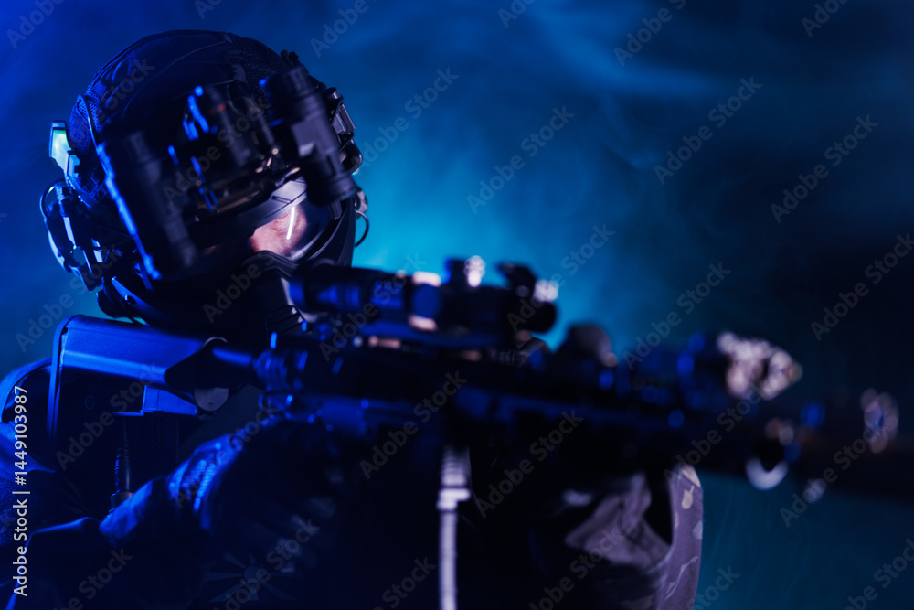 Special forces soldier with rifle equipped for night operations in ...