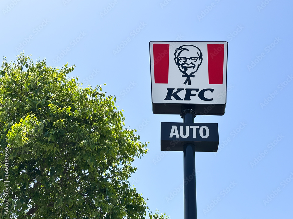 KFC restaurant sign with Colonel Sanders logo stands prominently ...