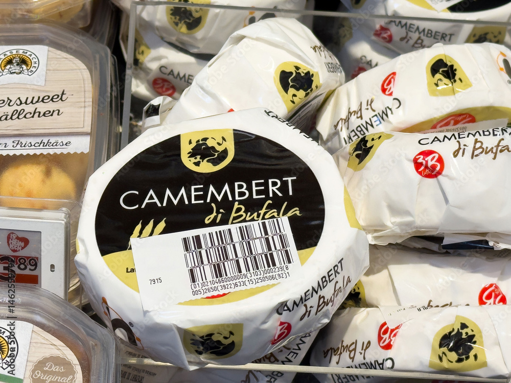 Camembert di bufala cheese wheel with barcode in grocery display Stock ...
