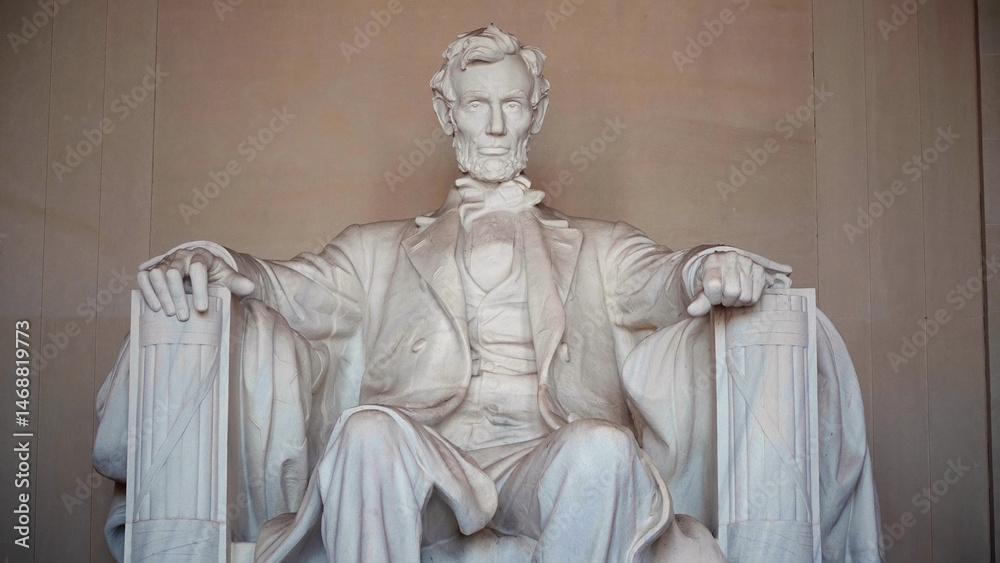 Imposing marble statue of President Abraham Lincoln sitting inside the ...