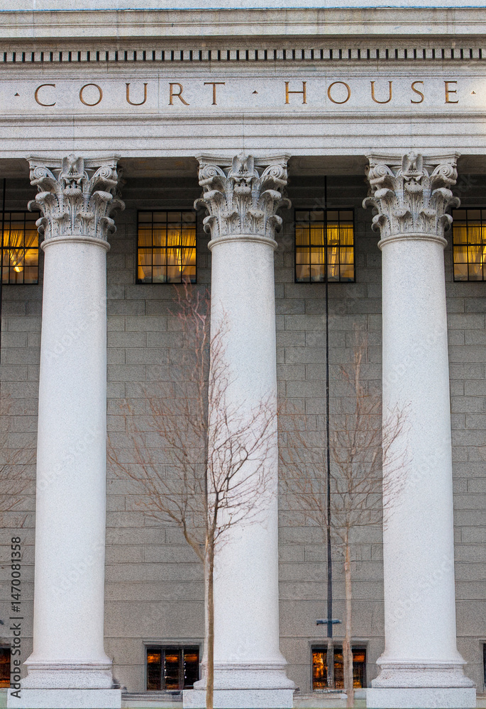 Facade of federal courthouse with towering columns With generative ...