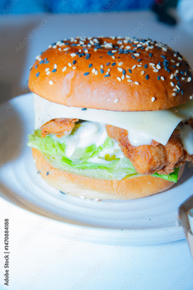 Deep-fried boneless Korean chicken burger with sweet buns. Crispy ...