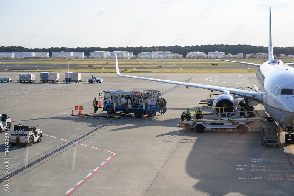 Narita, Japan – April 9, 2025: Ground staff work at Narita ...