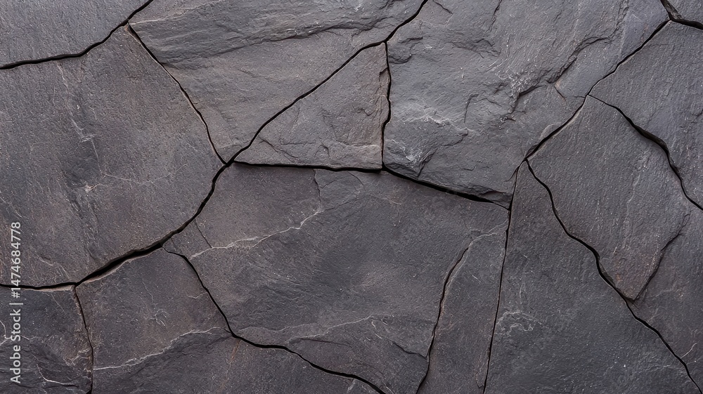 Textured basalt stone background, featuring cracks and a smooth ...