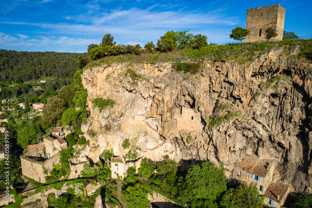 Cotignac, France and its beautiful troglodyte houses during Springtime ...