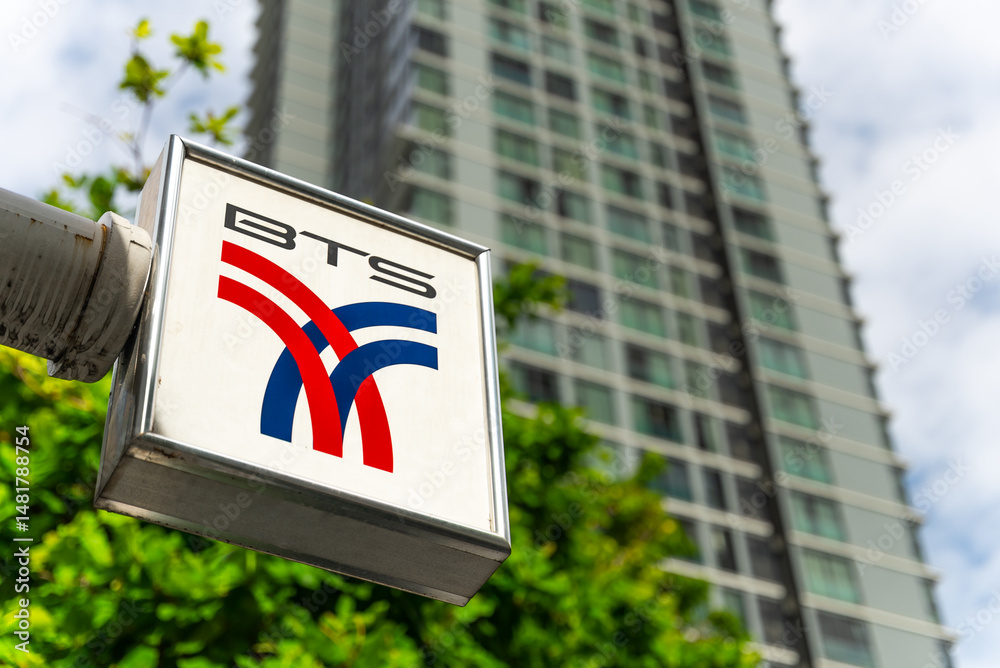 BTS Skytrain logo sign in front of high-rise building with copy space ...