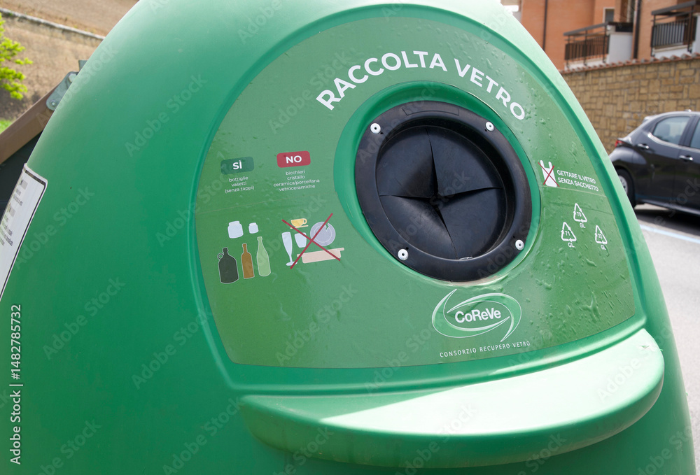 Rome, Italy - April 20, 2025: Green glass recycling bin labeled ...