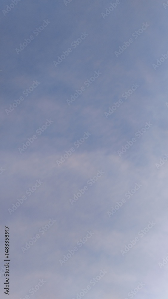 soft blue sky with light clouds, subtle cloud pattern in morning sky ...