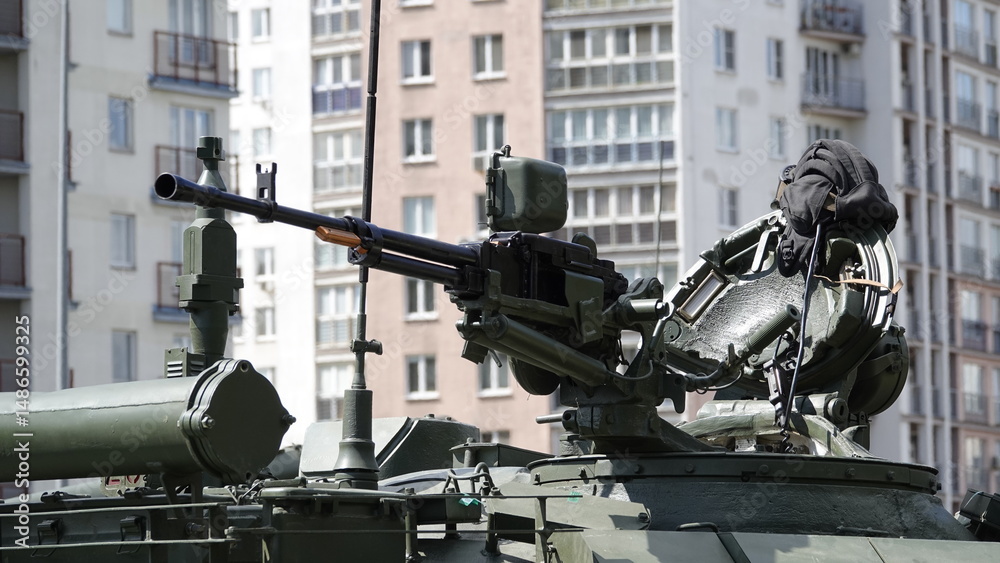 Large-caliber machine gun near the hatch of the tank. Machine gunner's ...