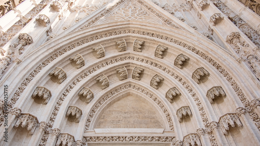 Ornate Gothic entrance of the iconic religious landmark with intricate ...