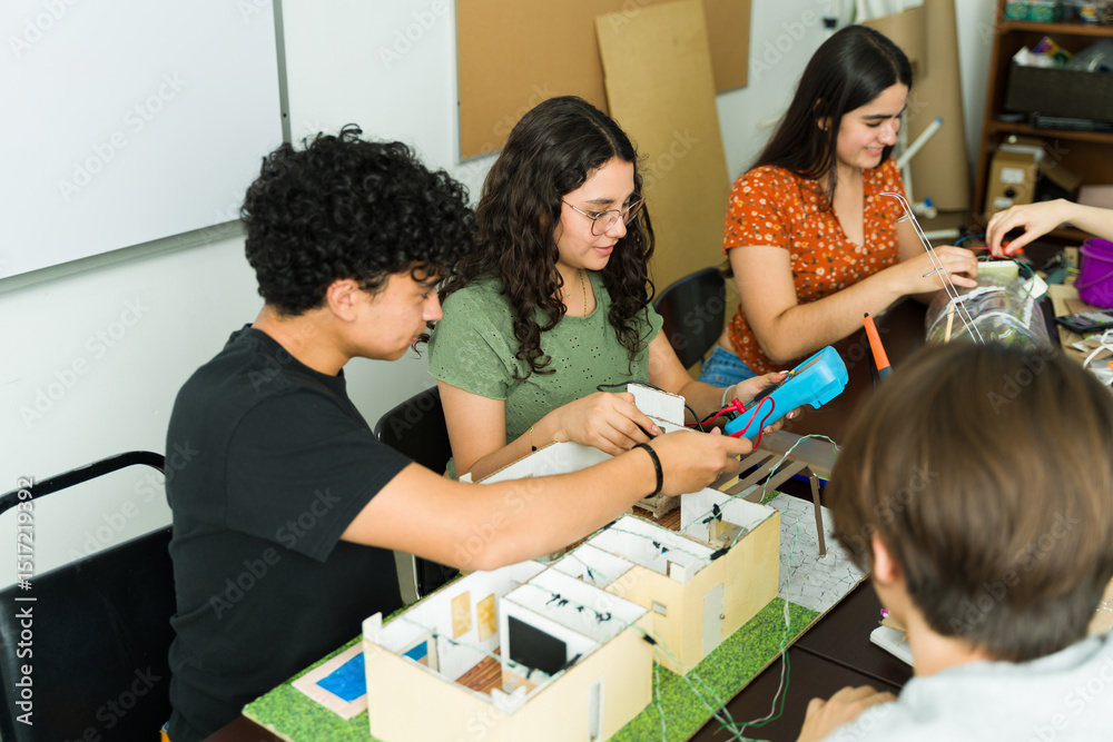 Stock-Foto „High school students working on electronics project for ...