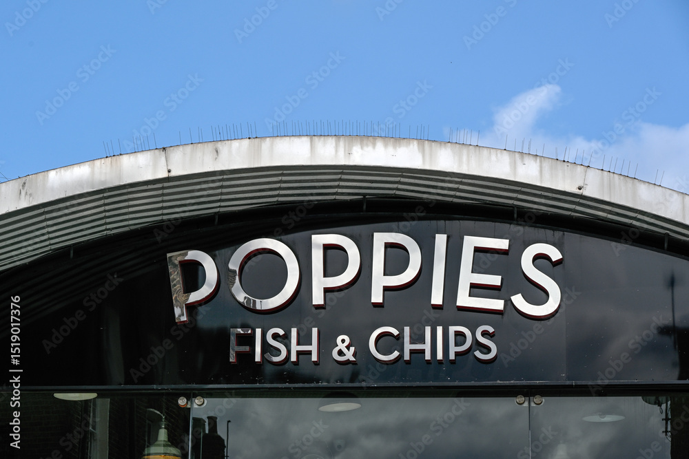 LONDON, UK - MAY 31, 2025: Sign for Poppies fish and chip Shop in Old ...