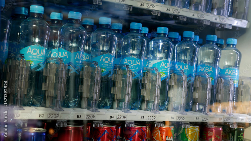Aqua minerale water bottles in vending machine Stock Photo | Adobe Stock
