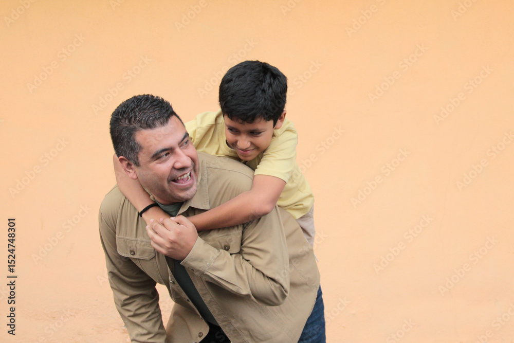 Divorced single dad plays with his 10-year-old dark-skinned Latino son ...