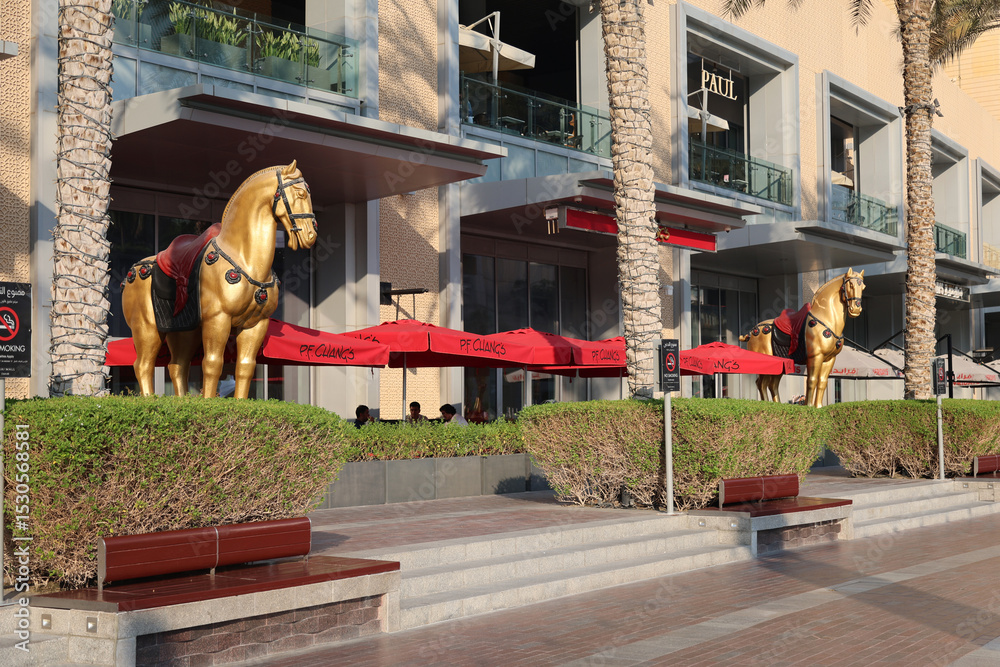 Dubai, UAE - September 25, 2024, Golden Horse Statues in the Heart of ...