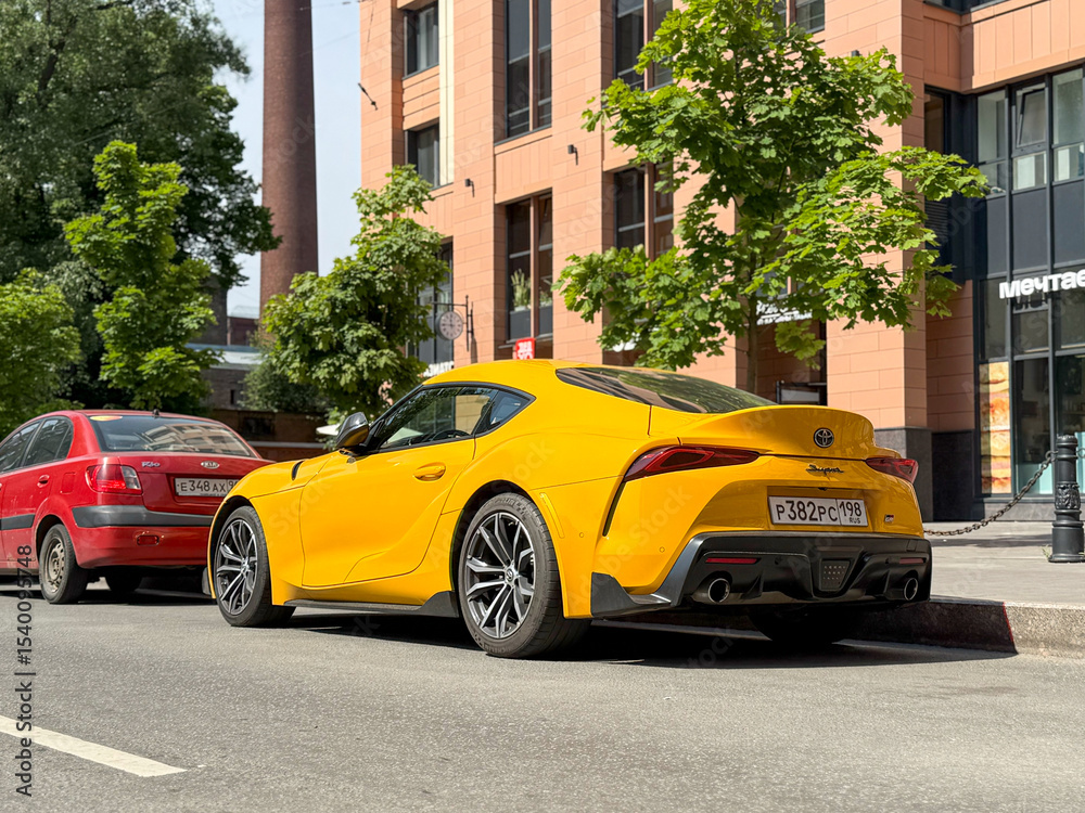 Foto Yellow sport car Toyota Supra GR V (A90, A91) MK 5 in a parking ...