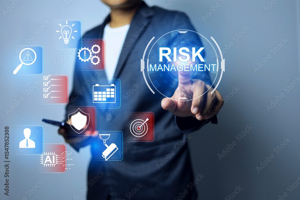 Risk management concept with businessman pointing on management icon to ...