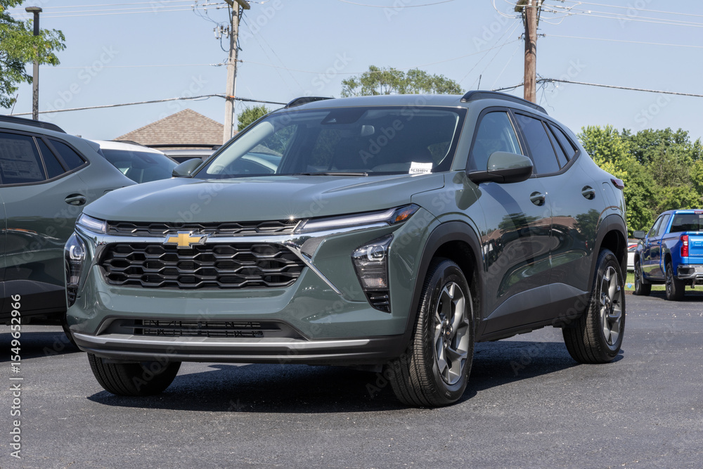 Chevrolet Trax 1LT Small SUV display at a dealership. Chevy offers the ...
