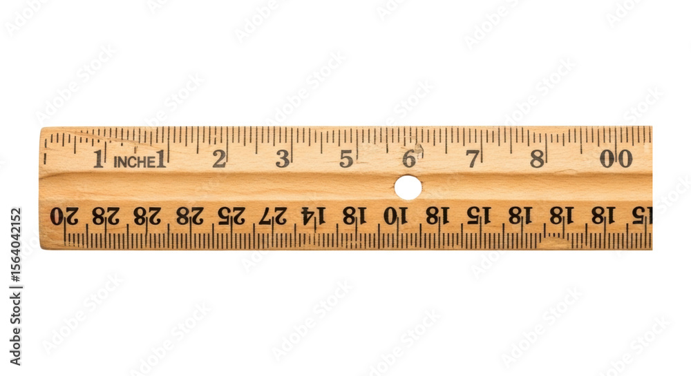 Wooden ruler with inch and centimeter measurements on transparent ...