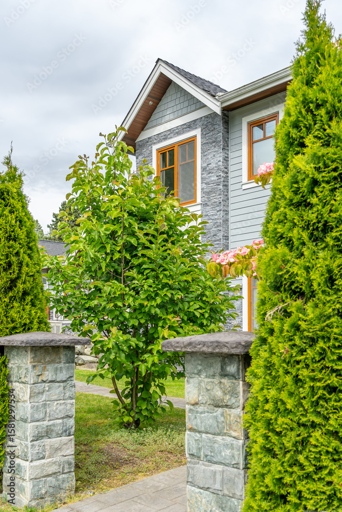 Entrance of painted luxury house in spring with stair steps and nice ...