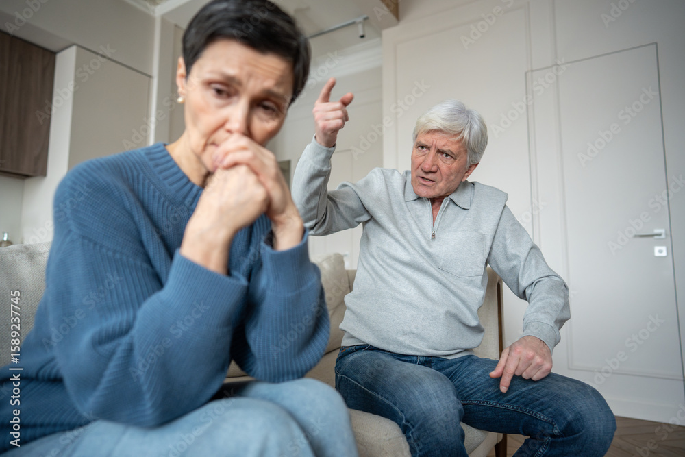 Hysterical elderly man yelling and scolding depressed wife, disturbance ...