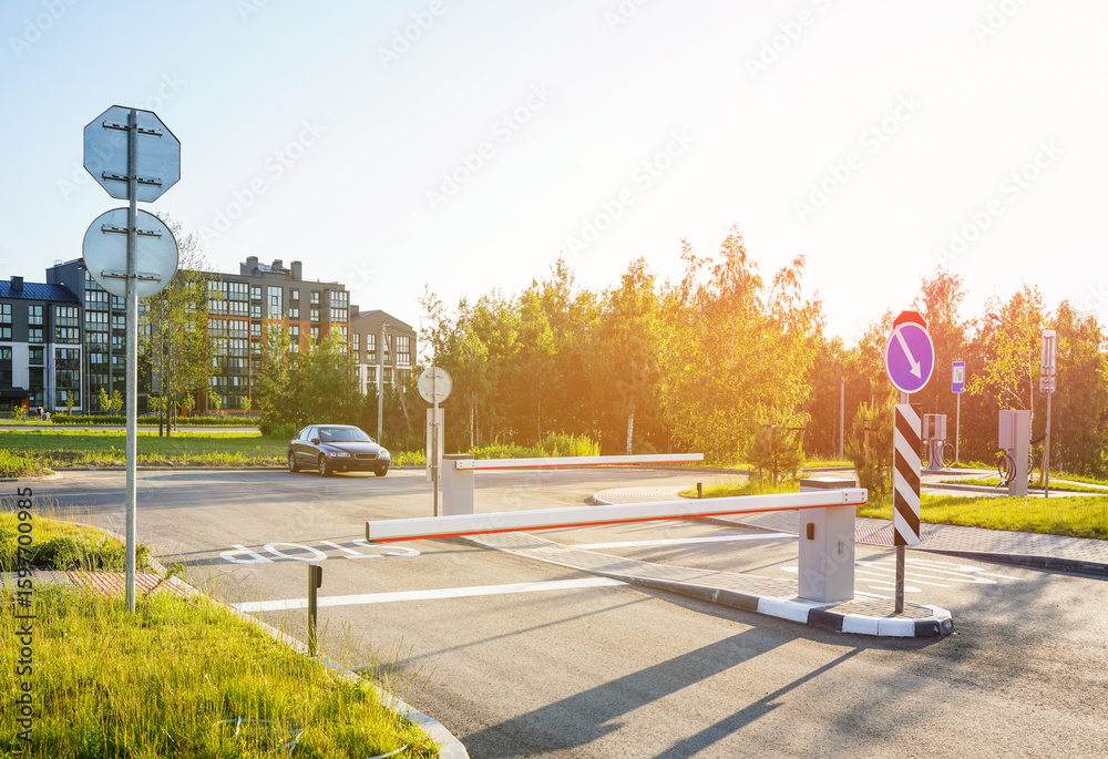 Automatic car barrier in Private urbanization residential area. Car ...