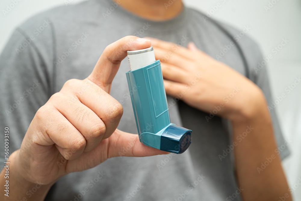 Asthma and chronic obstructive pulmonary disease COPD, Asian young man ...
