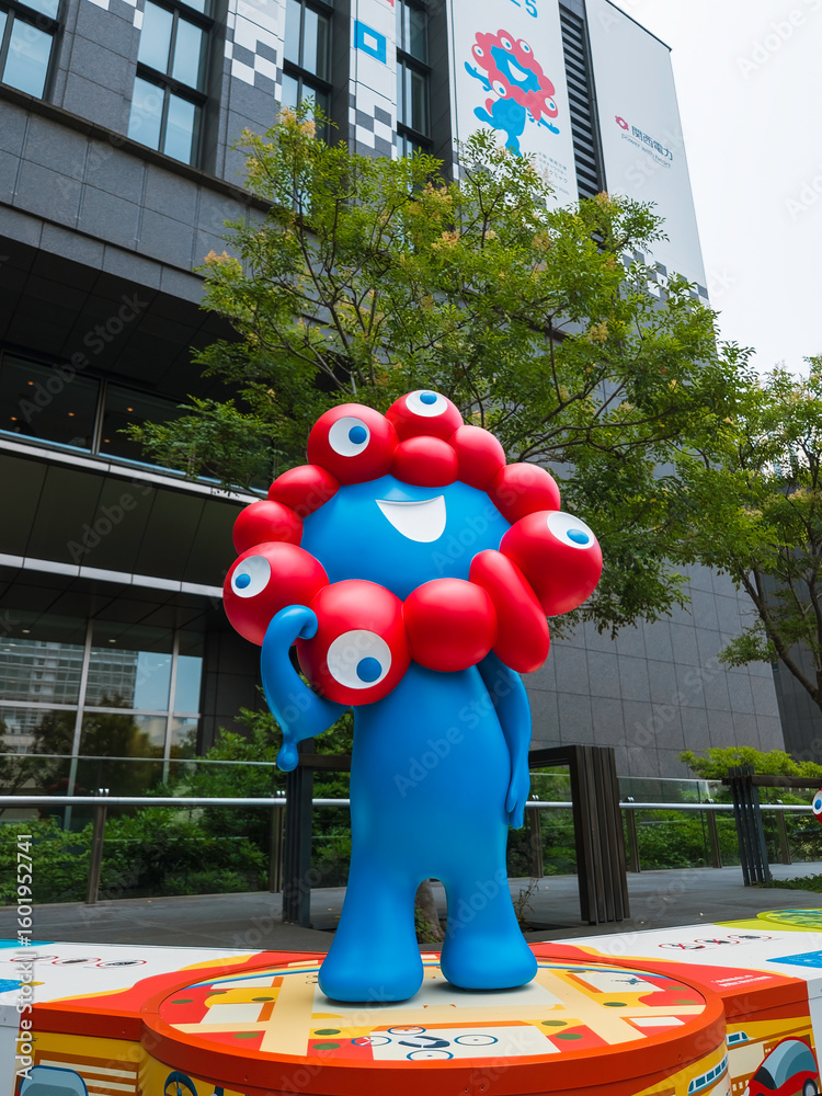 Osaka Expo 2025 Myaku-Myaku Official mascot character standing outdoor public building : Osaka ...