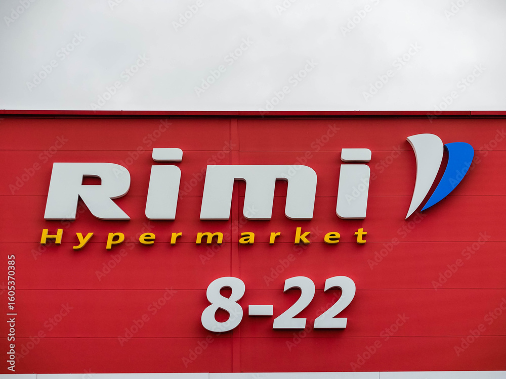 Ogre, Latvia - 08.07.2025: Rimi hypermarket logo and working hours ...