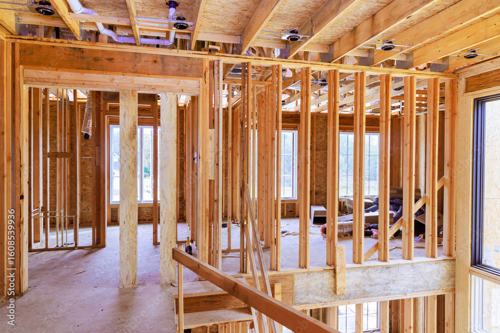Construction site wooden framework in residential house with large ...