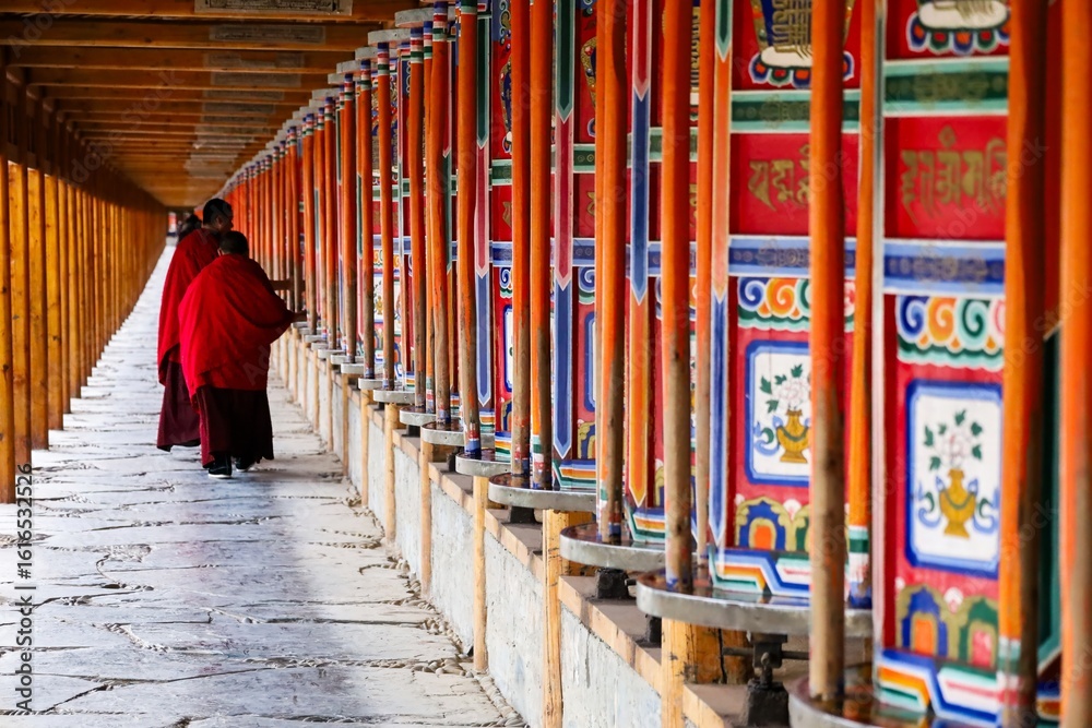 Foto de Stock Monks walking along the world’s longest prayer wheel ...