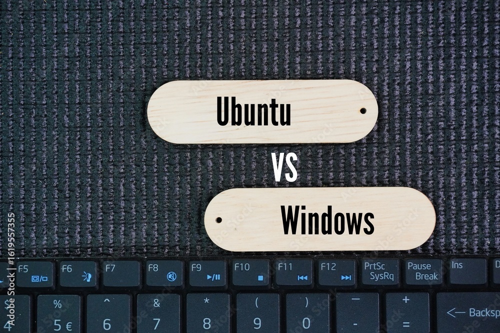 Laptop keyboard with the two words Ubuntu and Windows. Ubuntu is a ...