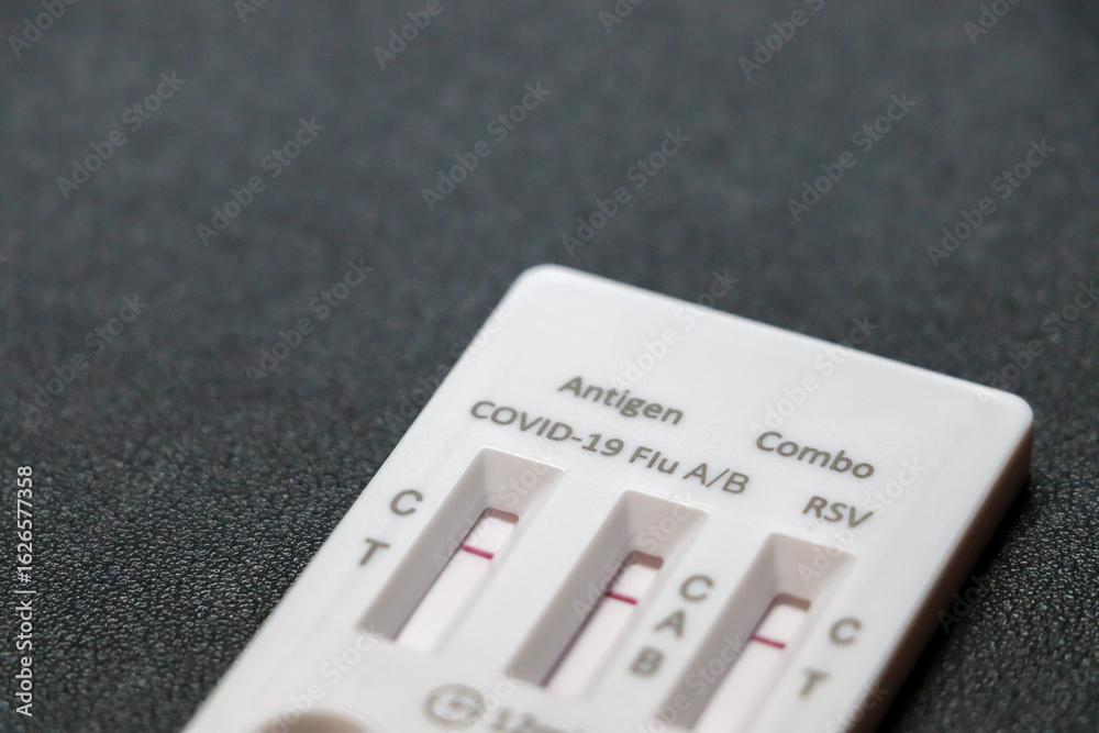 Stock-Foto „Antigen test kit for COVID-19, Flu A/B, and RSV placed on a ...