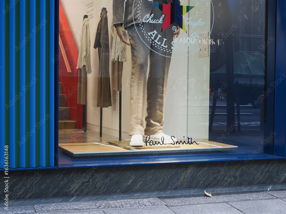 TOKYO, JAPAN - August 8 2025: Display in the window of a Paul Smith ...