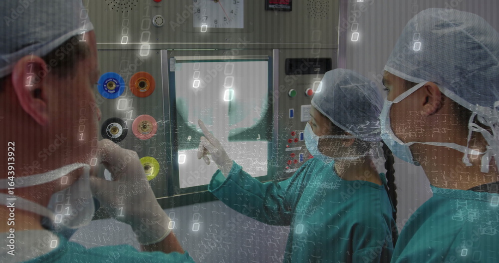 Pointing surgeon highlighting radiograph on X-ray screen at control ...