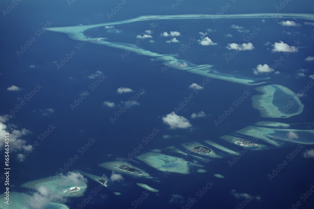 Chain of inhabited islands, from right Keyodhoo, Felidhoo, Thinadhoo ...
