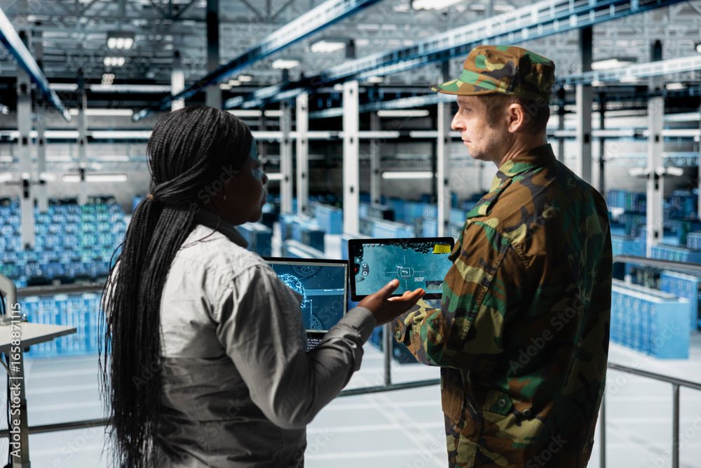 Army soldiers in data center visualizing ballistic missiles flight ...