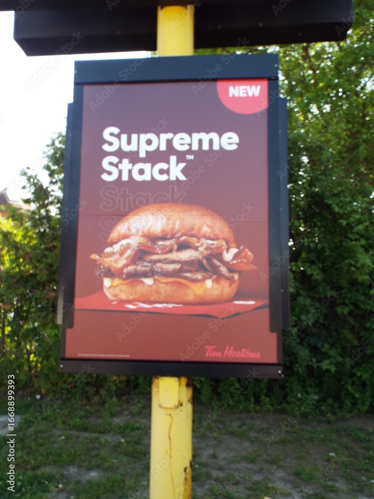 Ottawa, ON, Canada, June 13, 2025: A menu board or sign from a Tim ...