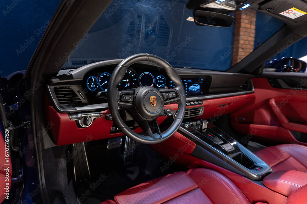 Cockpit of a Porsche 911 with a red leather interior, Luxury cabin of a ...