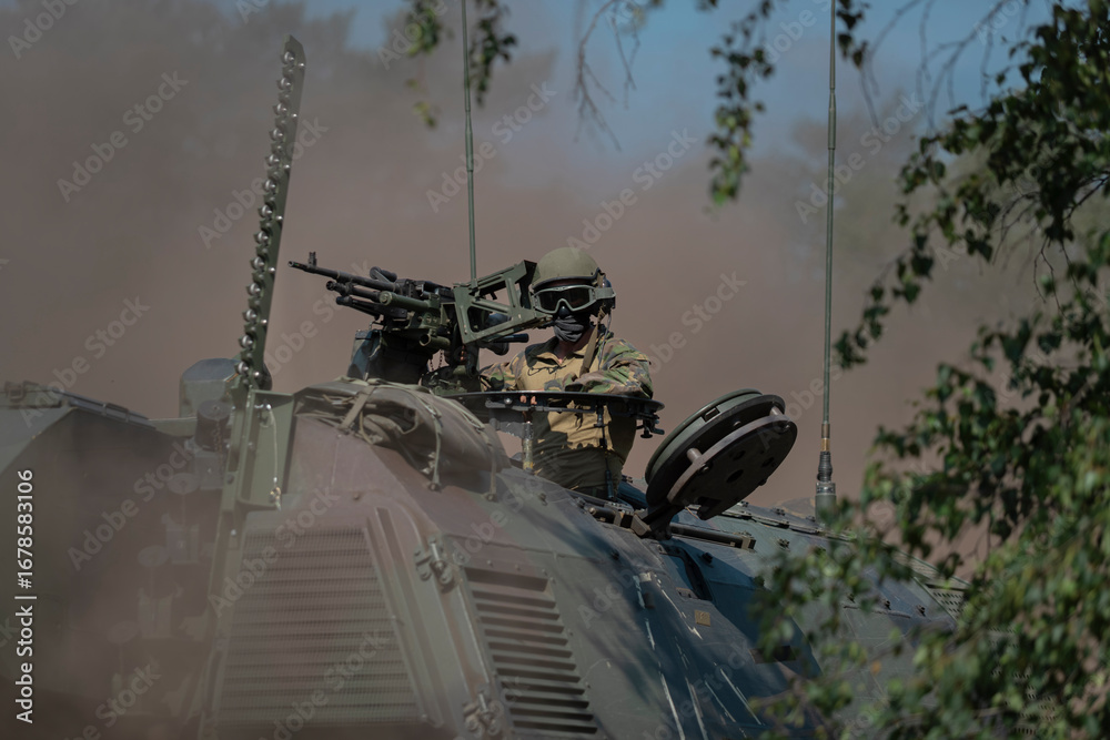 Military personnel operating advanced fire control systems on self ...