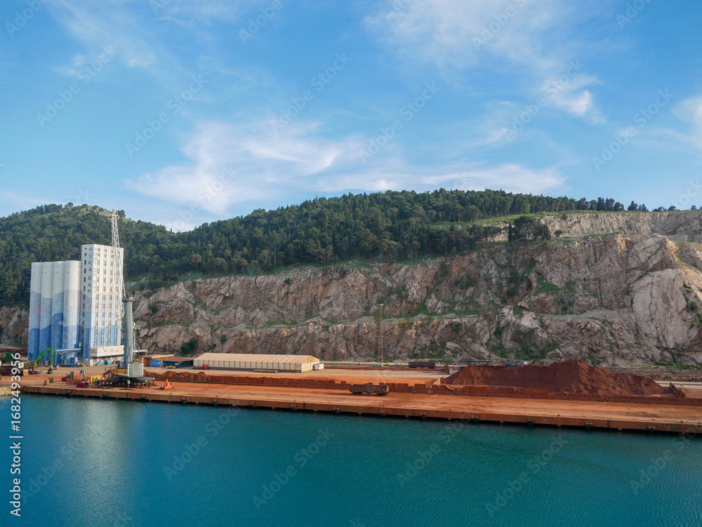 Grain silos and industrial crane at the dry bulk cargo terminal of Port ...