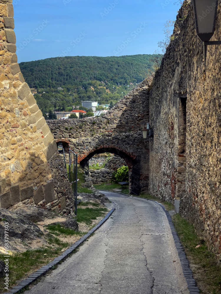 Trencin, Slovakia - August 28, 2025: The road to the gates of the ...