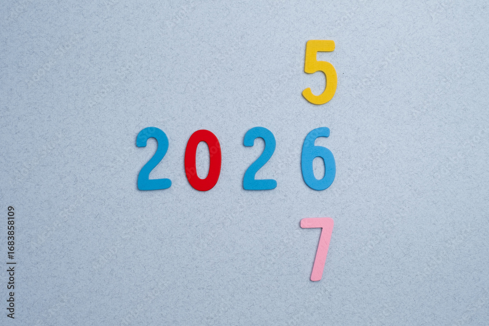 Colored numbers of the calendar for 2026 on the background. Happy New ...