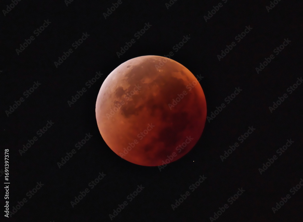 Стоковое фото «Tokyo, Japan - September 8, 2025: Total Lunar Eclipse ...