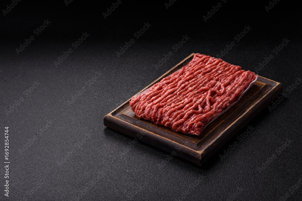 Raw ground beef or pork, fresh meat for burgers or other dishes. Raw ...