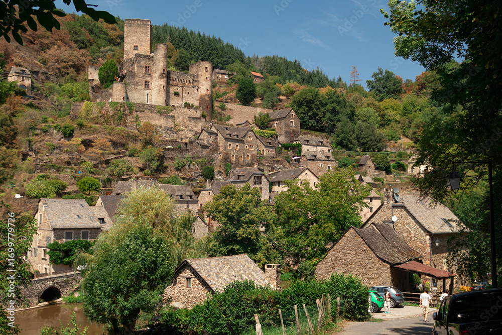 Belcastel village, castle and medieval bridge over Aveyron river, one ...