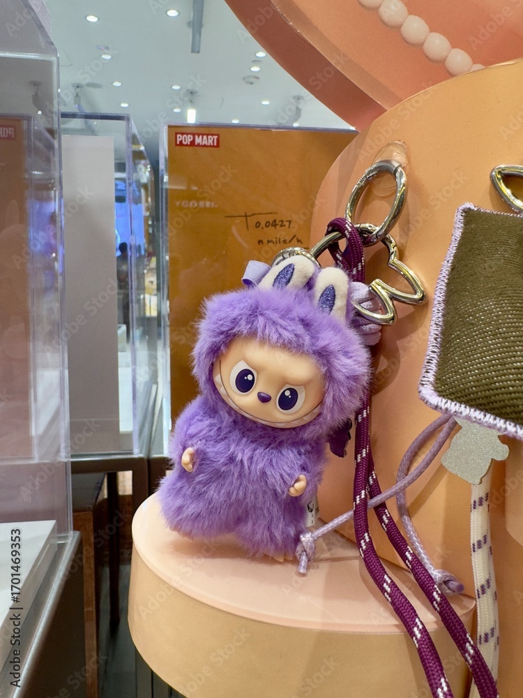 Tukwila, WA - September 11, 2025. Purple Labubu plush toy keychains ...