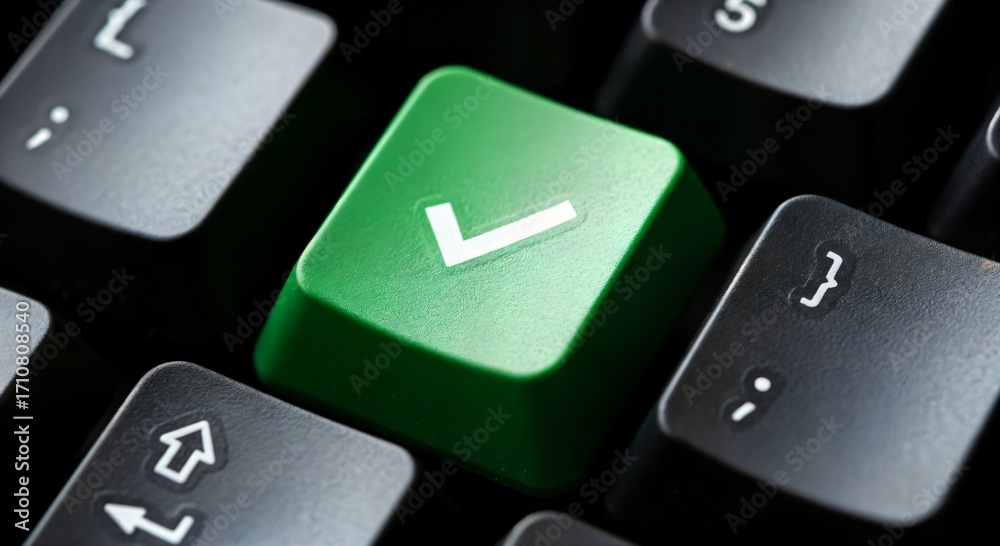 Green check mark key on a keyboard illustrating online approval ...
