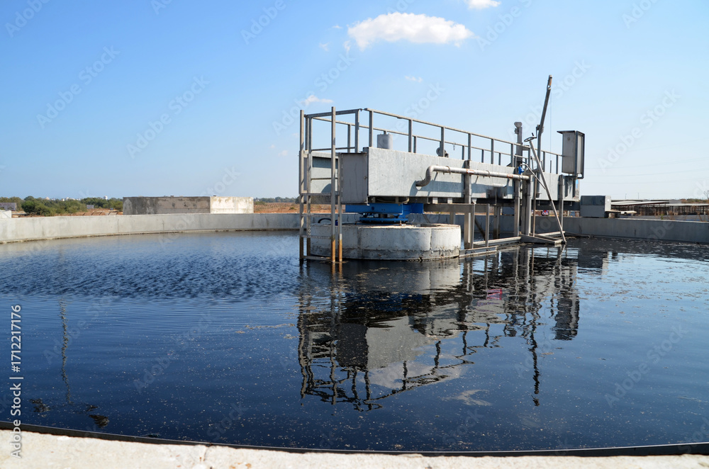 A detailed, abstract view of water and metal structures inside a ...